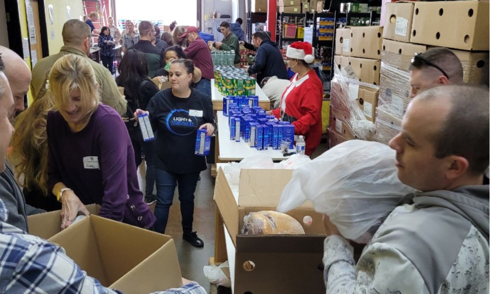 Project 150 Holiday Meal Box Assembly a Hugh Success - JustServe